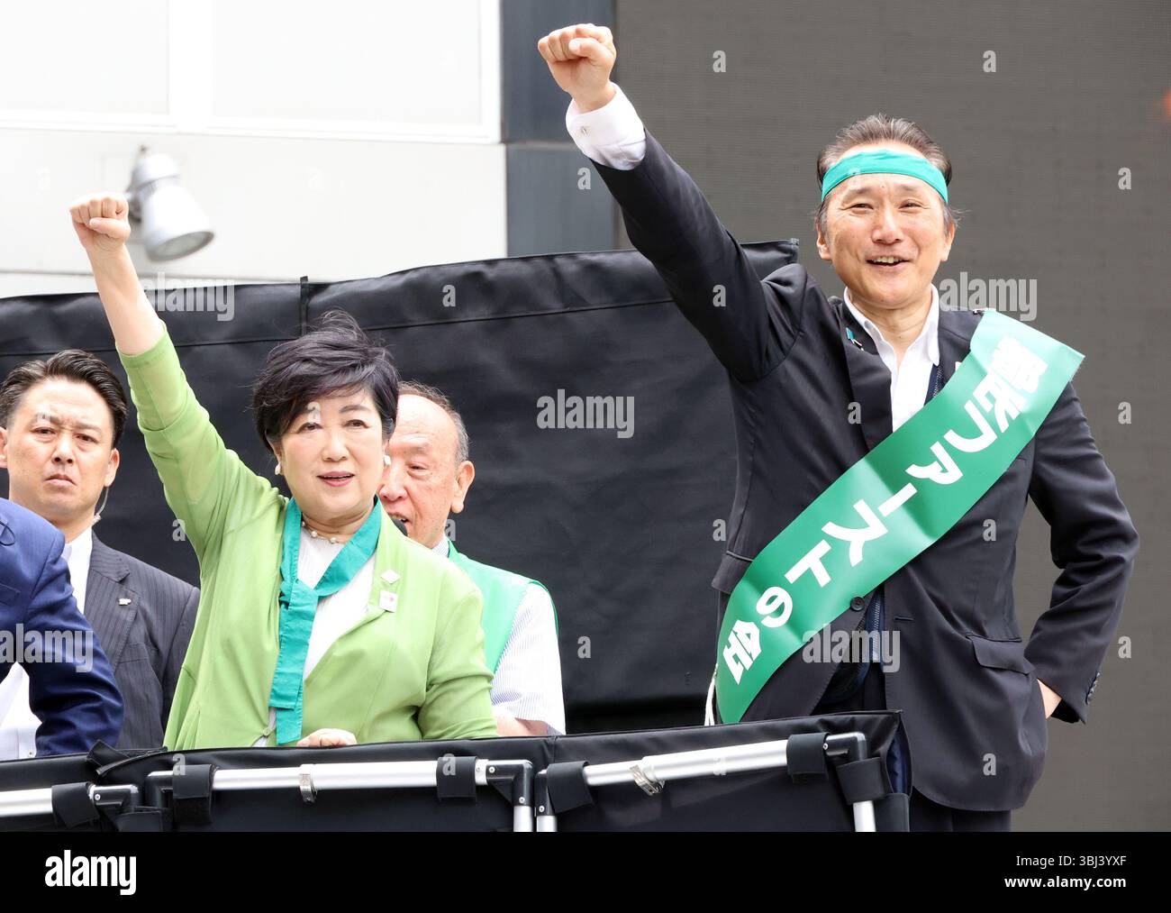 Tokyo, Japan. 13th June, 2025. Tokyo Governor Yuriko Koike (L) and her ...