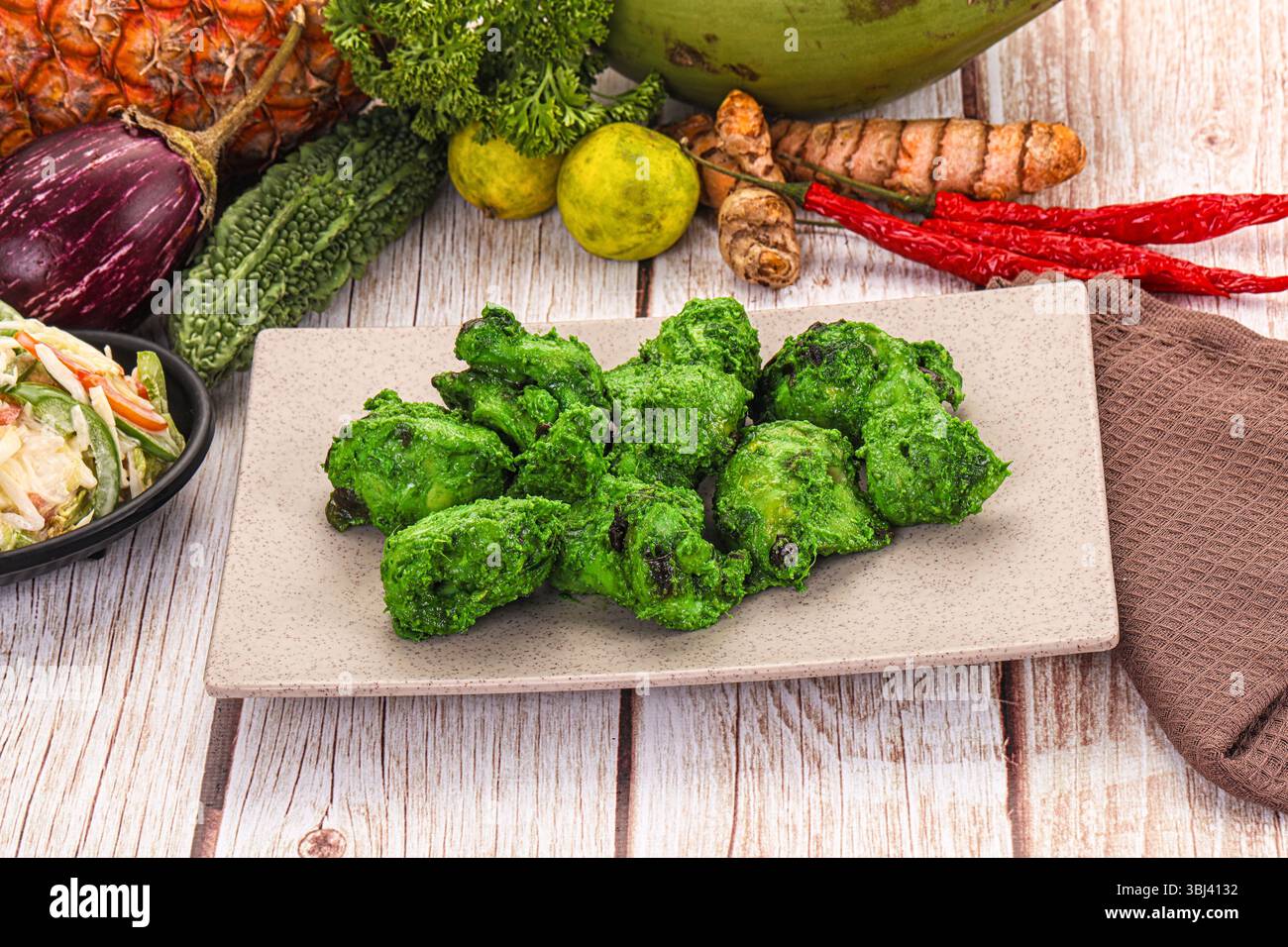 Indian green chicken mint tikka barbecue Stock Photo - Alamy