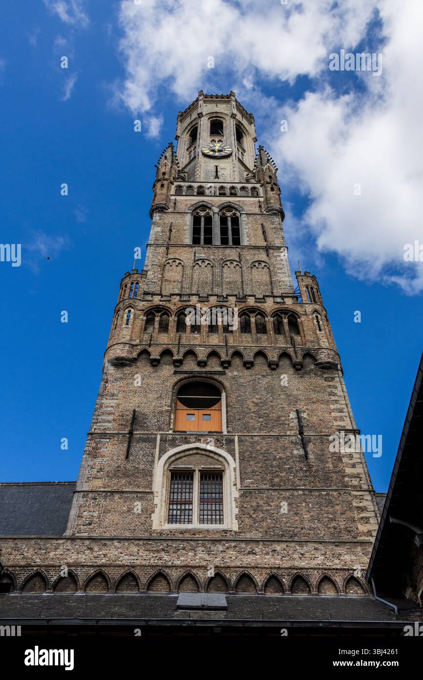 A close up view of the Belfry of Bruges, seen from the ground in the ...