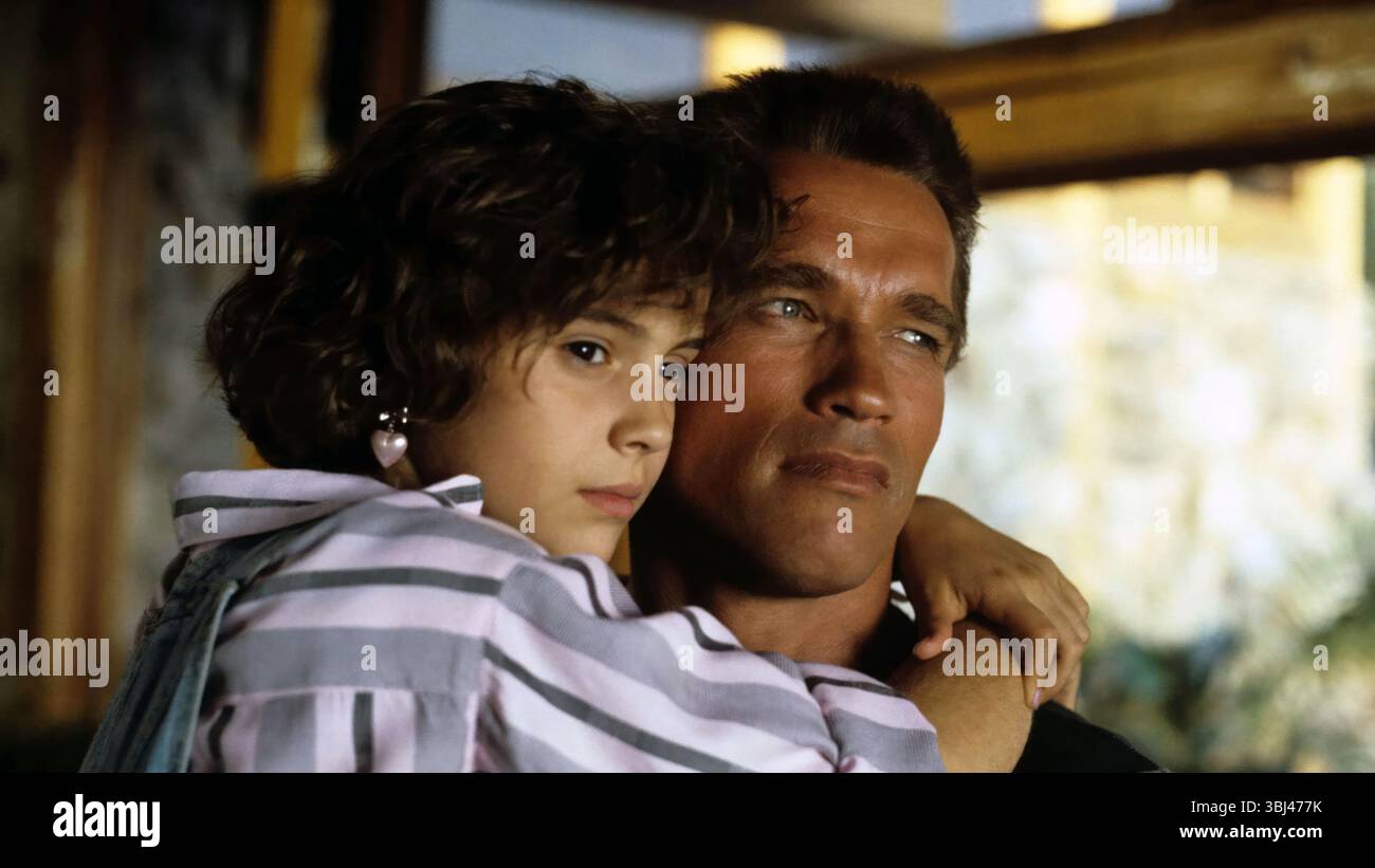 ARNOLD SCHWARZENEGGER and ALYSSA MILANO in COMMANDO (1985), directed by ...