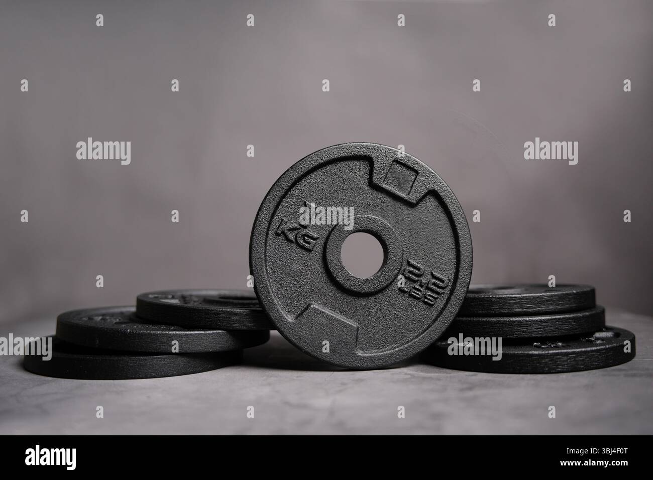 adjustable studio weight discs Stock Photo - Alamy