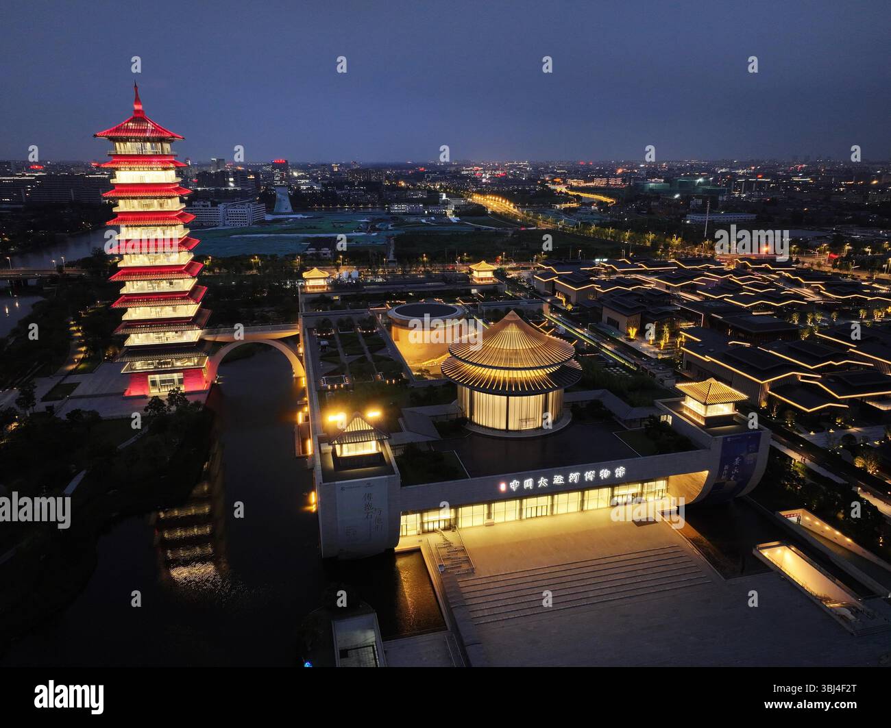 Aerial photo shows the night view of the China Grand Canal Museum in ...