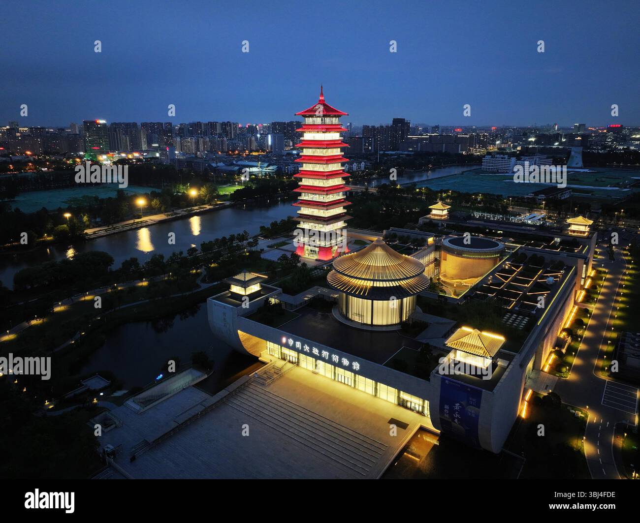 Aerial photo shows the night view of the China Grand Canal Museum in ...