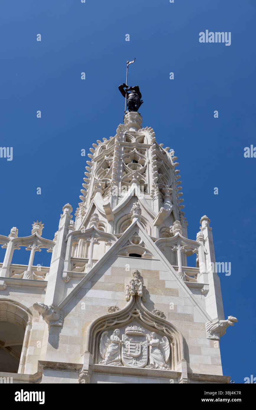 A striking close-up of a Gothic building's spire pierces the sky Stock ...