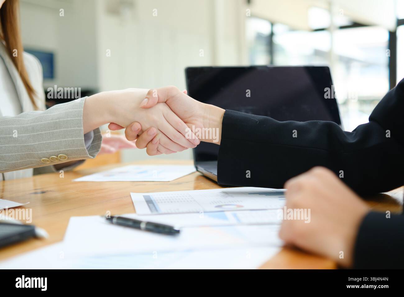 Partnership business shaking hands for agreement Stock Photo - Alamy