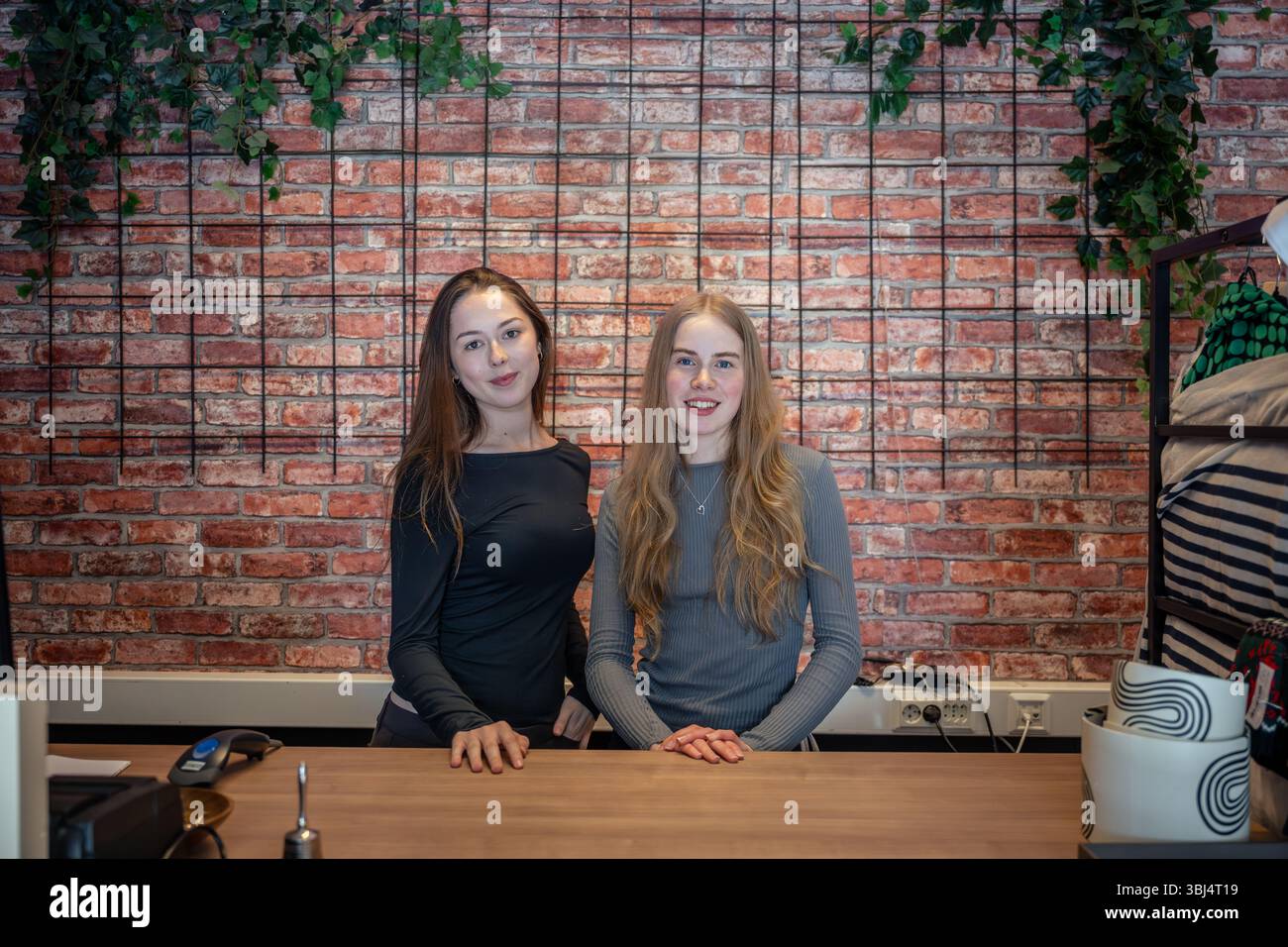 Service counter retail interaction hi-res stock photography and images ...