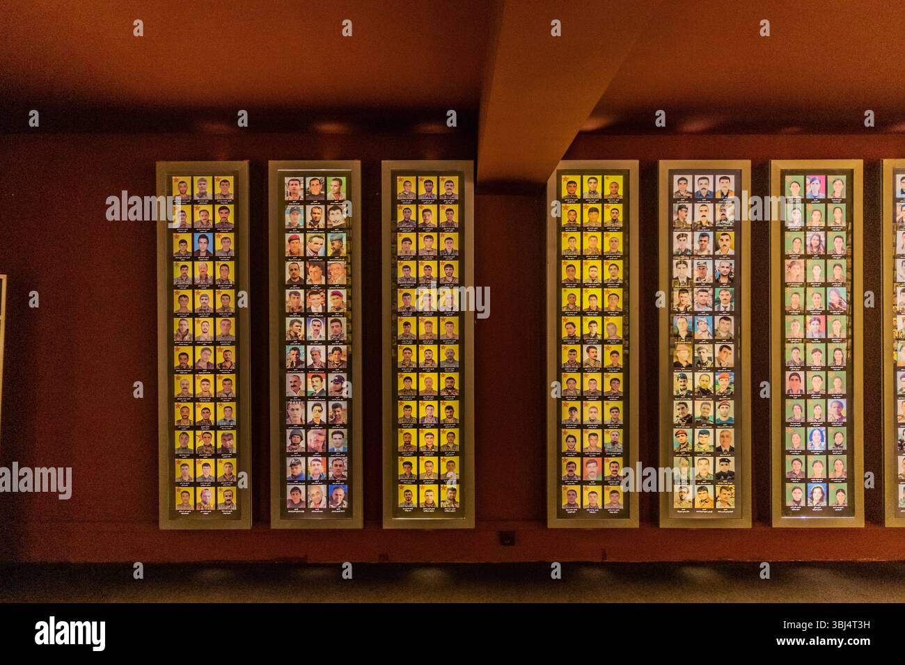 SULAYMANIYAH, IRAQ - OCTOBER 6, 2022: ISIS war victims photos in Amna ...