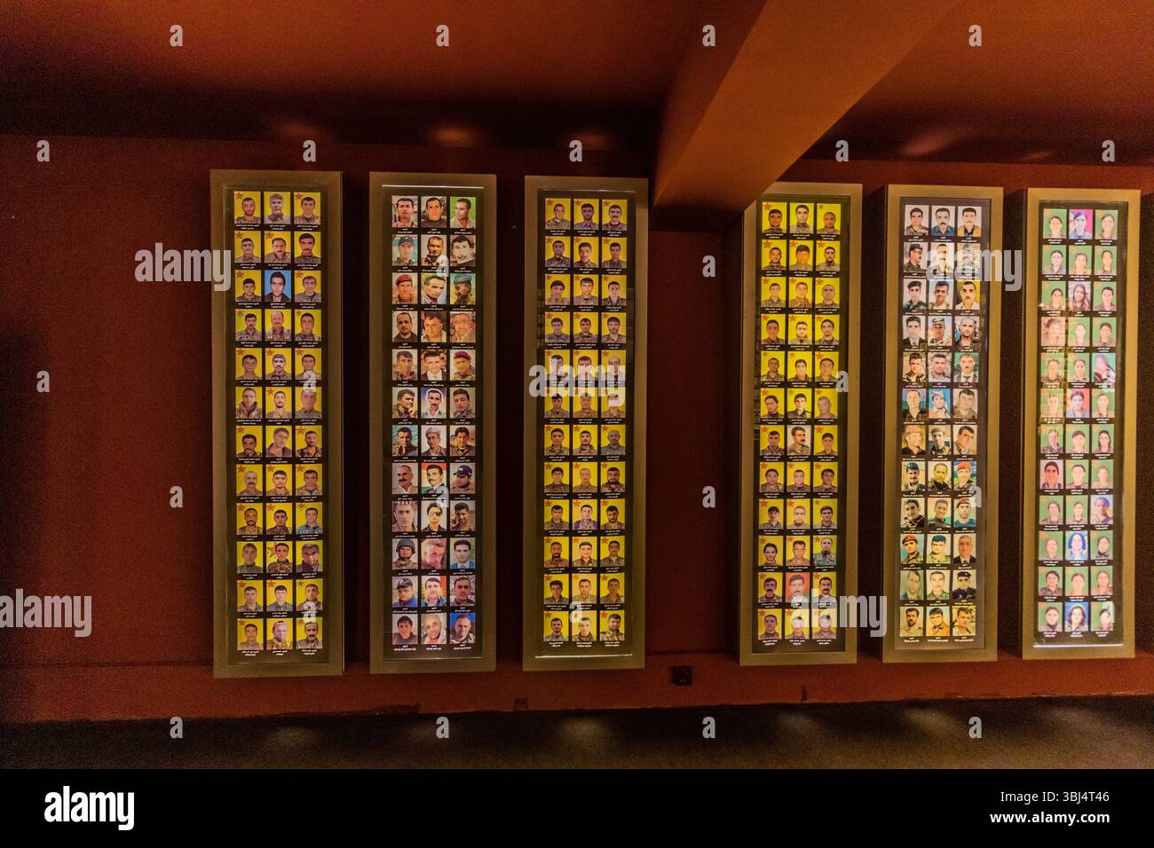 SULAYMANIYAH, IRAQ - OCTOBER 6, 2022: ISIS war victims photos in Amna ...