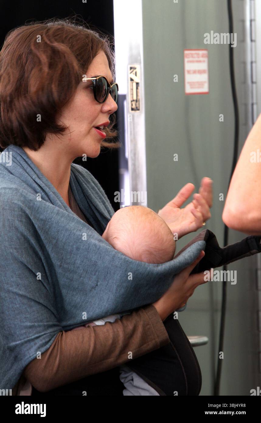 Maggie Gyllenhaal and her husband Peter Sarsgaard with their children ...