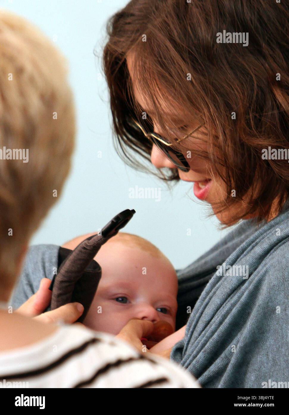 Maggie Gyllenhaal and her husband Peter Sarsgaard with their children ...