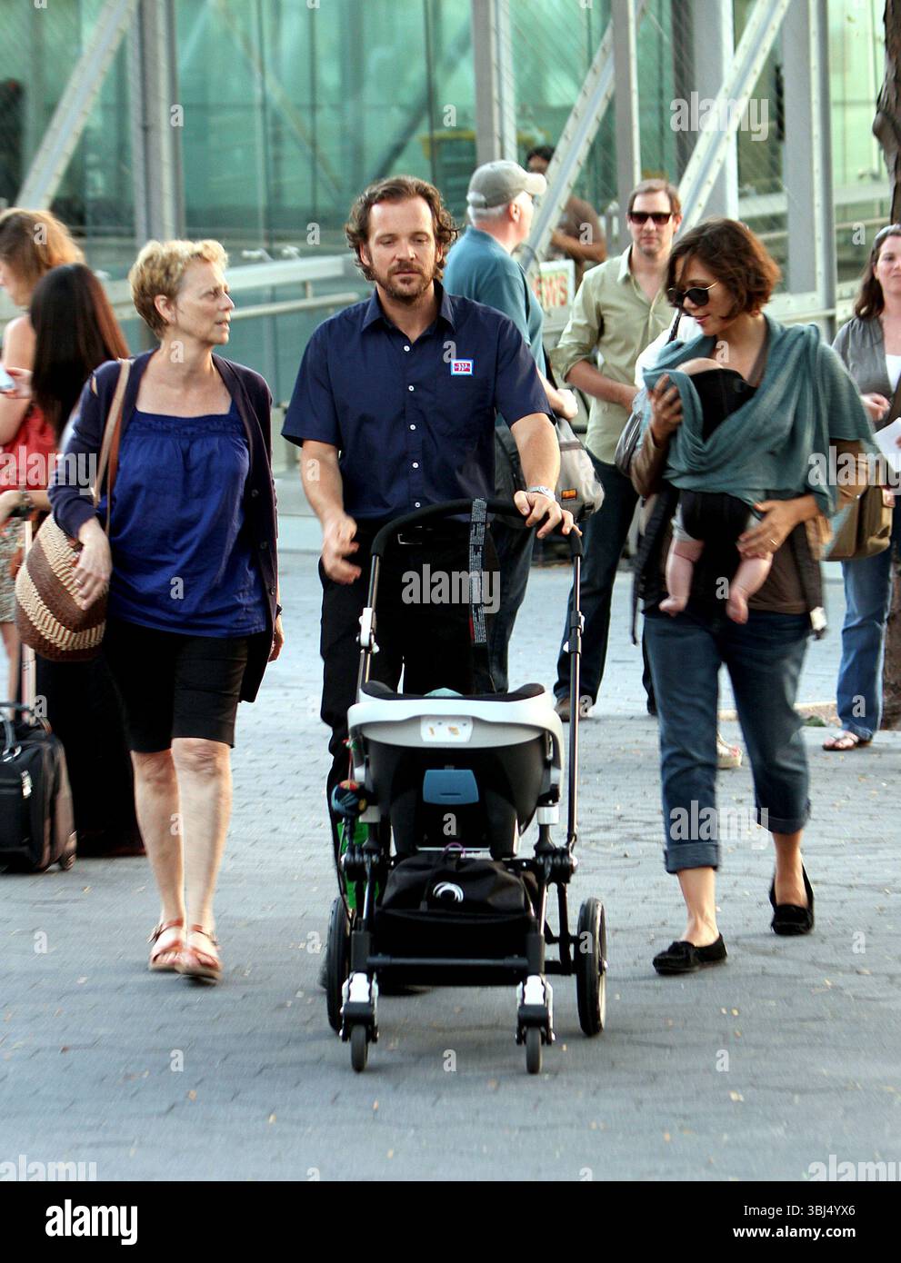 Maggie Gyllenhaal and her husband Peter Sarsgaard with their children ...
