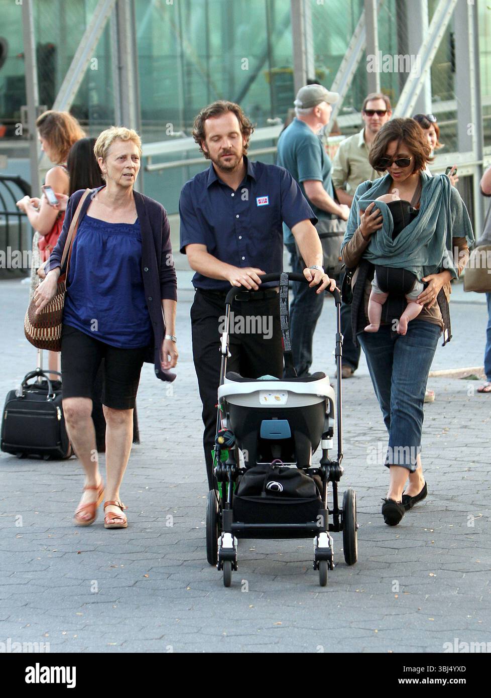 Maggie Gyllenhaal and her husband Peter Sarsgaard with their children ...