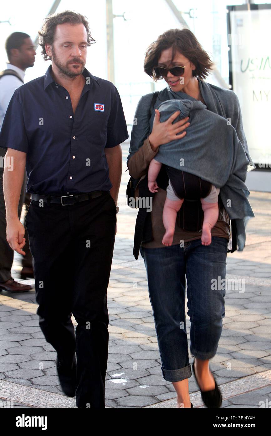 Maggie Gyllenhaal and her husband Peter Sarsgaard with their children ...
