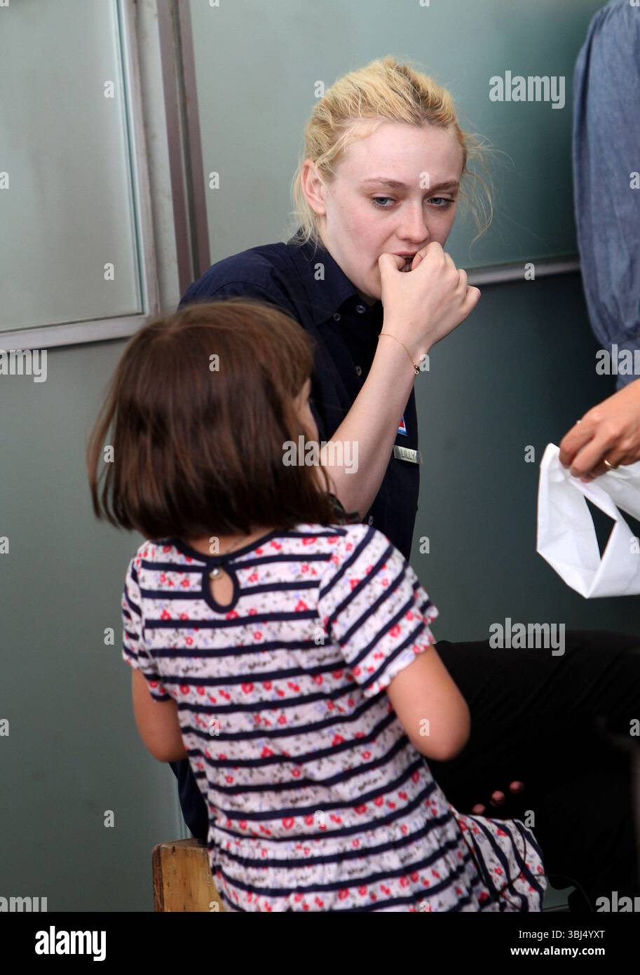 Maggie Gyllenhaal and her husband Peter Sarsgaard with their children ...