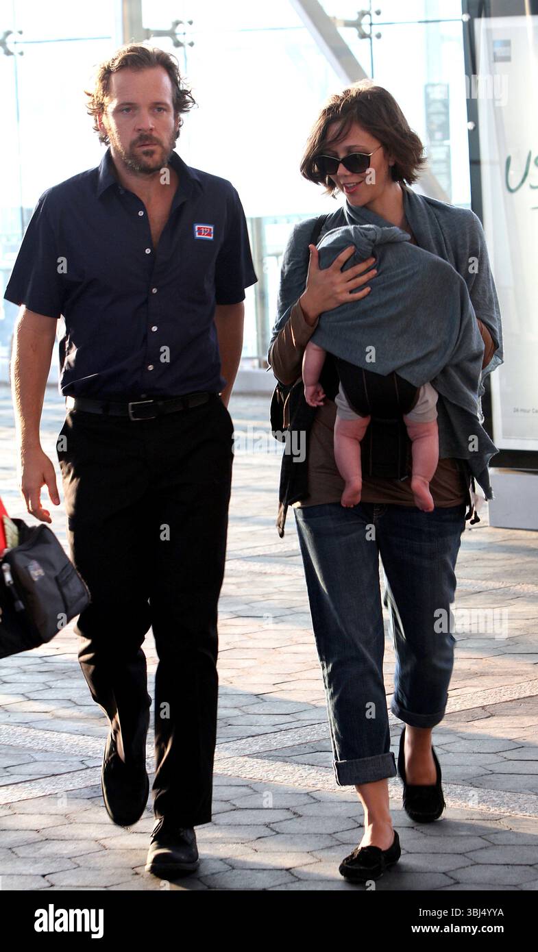 Maggie Gyllenhaal and her husband Peter Sarsgaard with their children ...