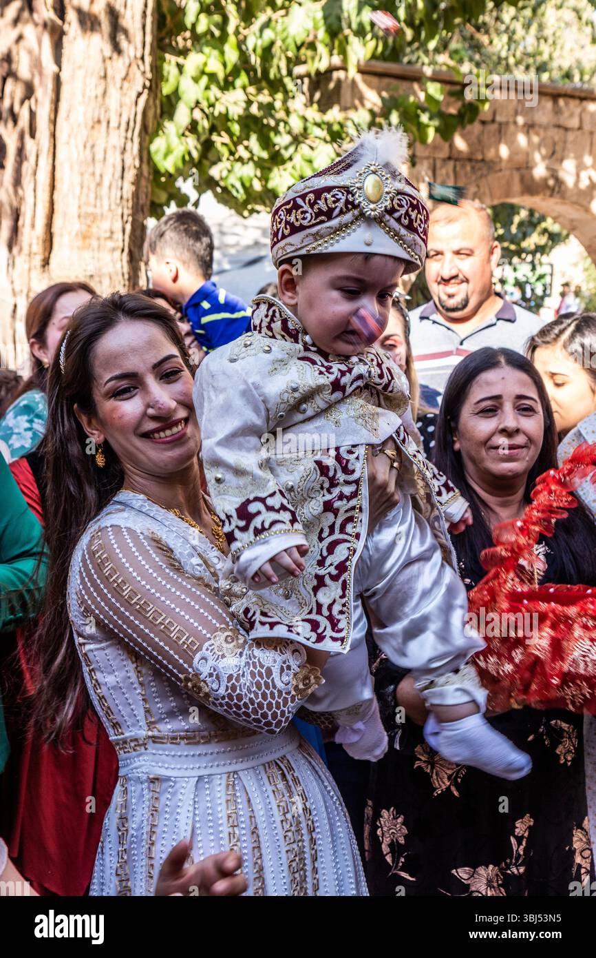 LALISH, IRAQ - SEPTEMBER 30, 2022: Yezidi baby after a baptism ceremony ...