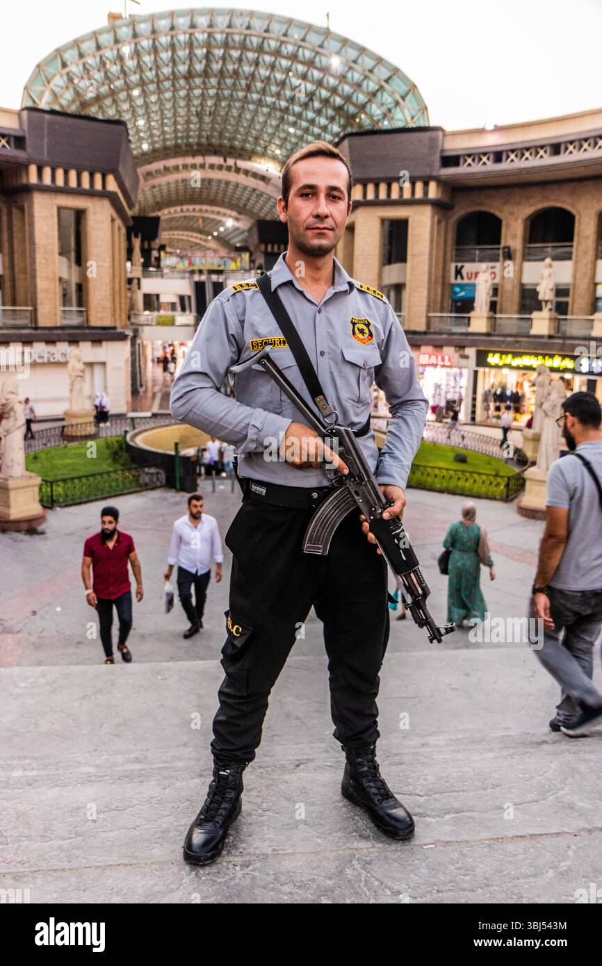 ERBIL, IRAQ - OCTOBER 8, 2022: Private security guard at the Downtown ...