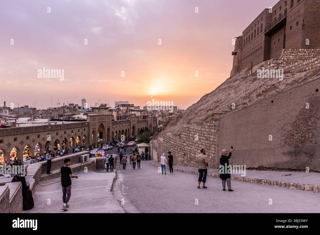 ERBIL, IRAQ - OCTOBER 9, 2022: Sunset seen from a road to Erbil citadel ...