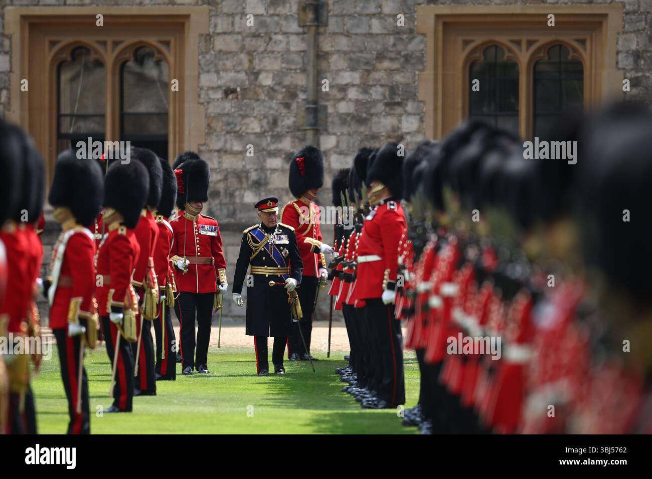 King Charles III, Colonel-in-Chief of the Coldstream Guards, inspects ...