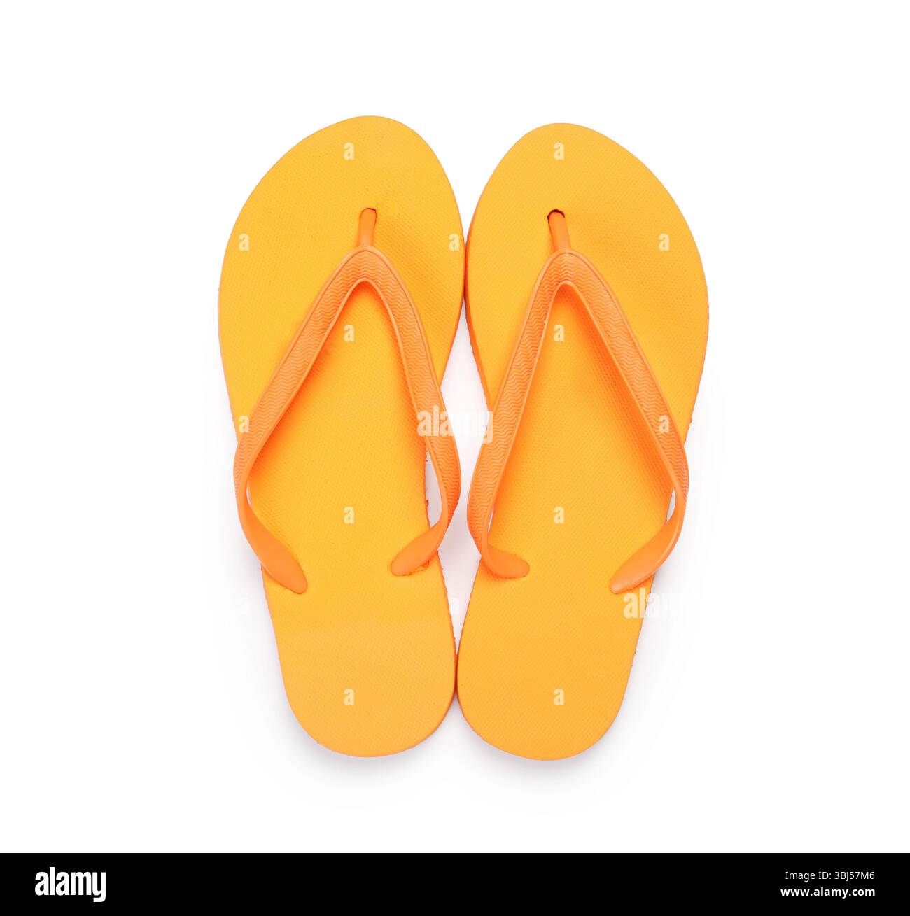 Stylish orange flip flops isolated on white, top view. Beach accessory ...