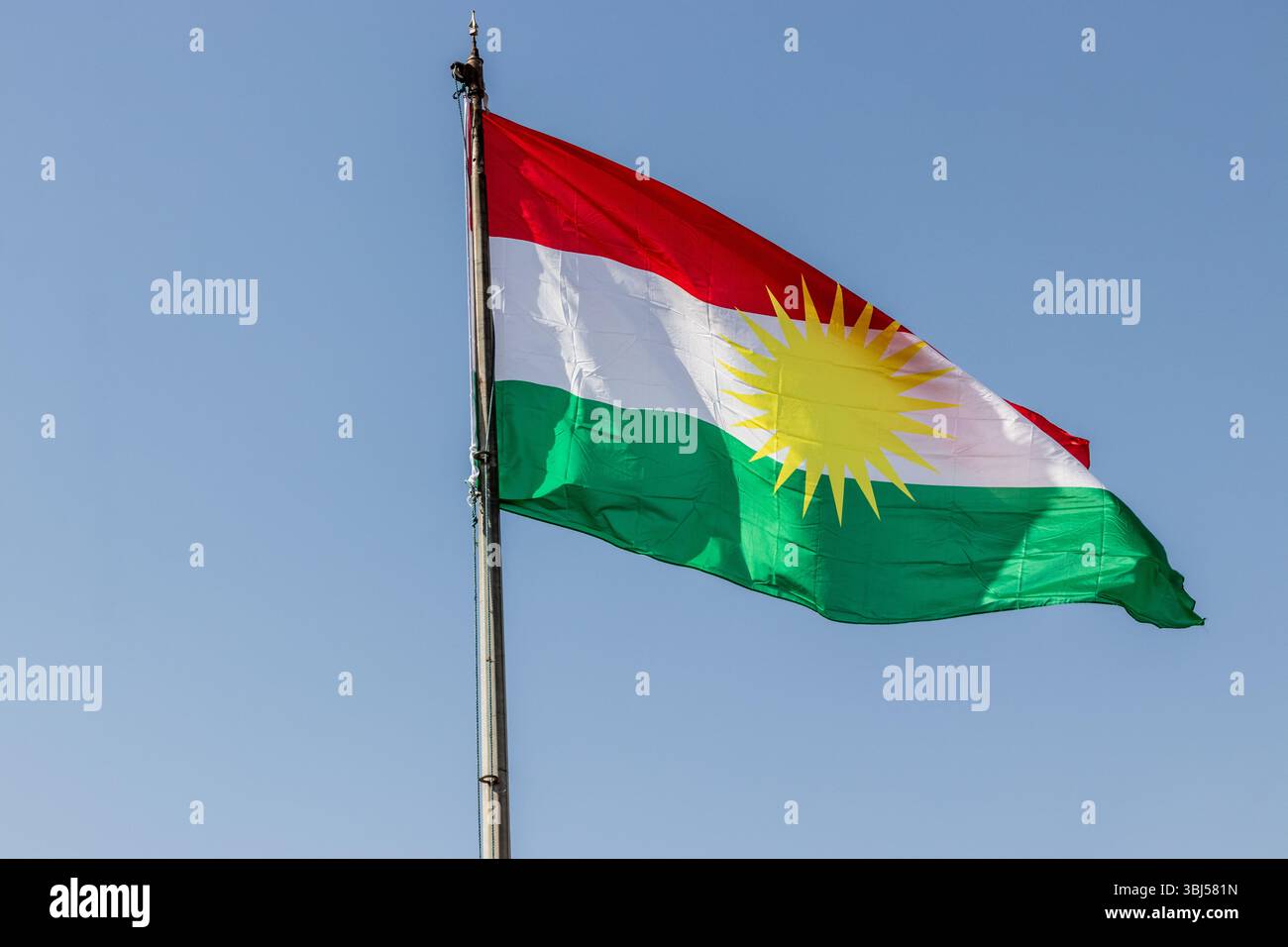 Flag of Kurdistan above Koy Sanjaq town, Kurdistan Region of Iraq Stock ...