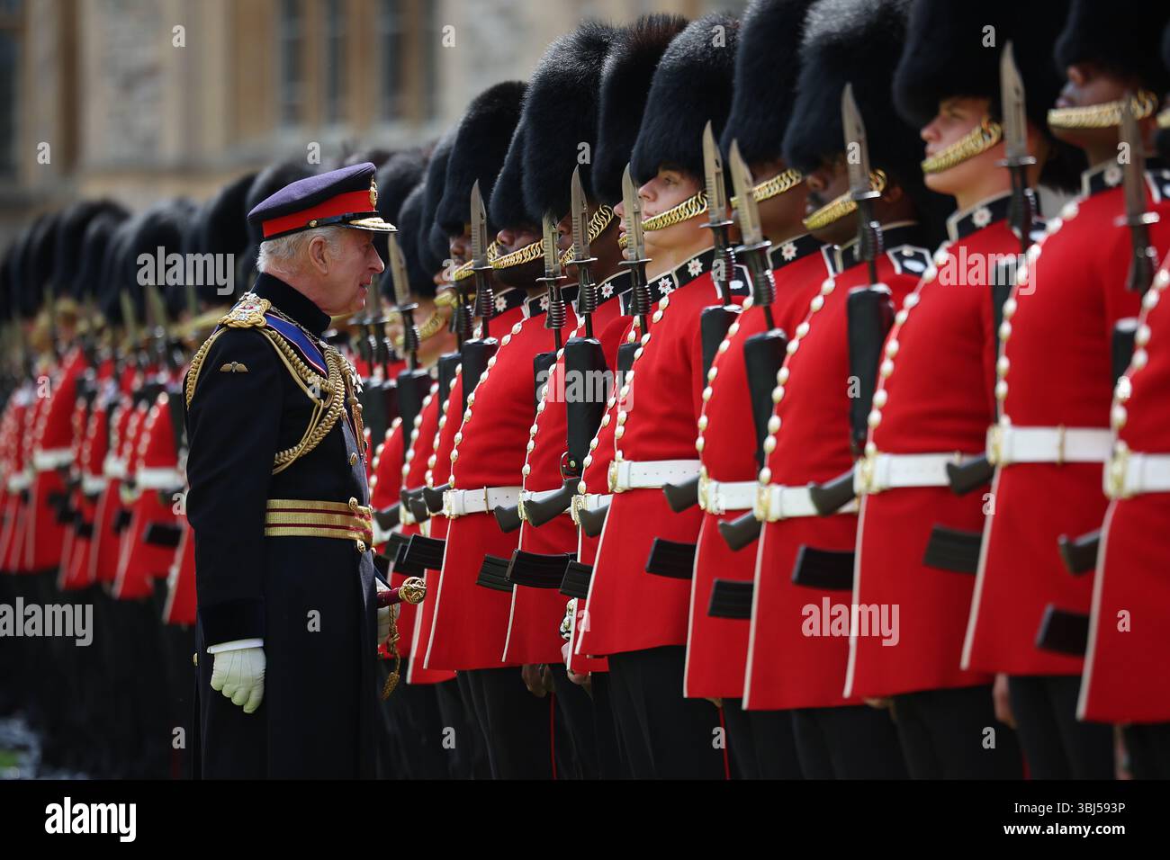 King Charles III, Colonel-in-Chief of the Coldstream Guards, inspects ...