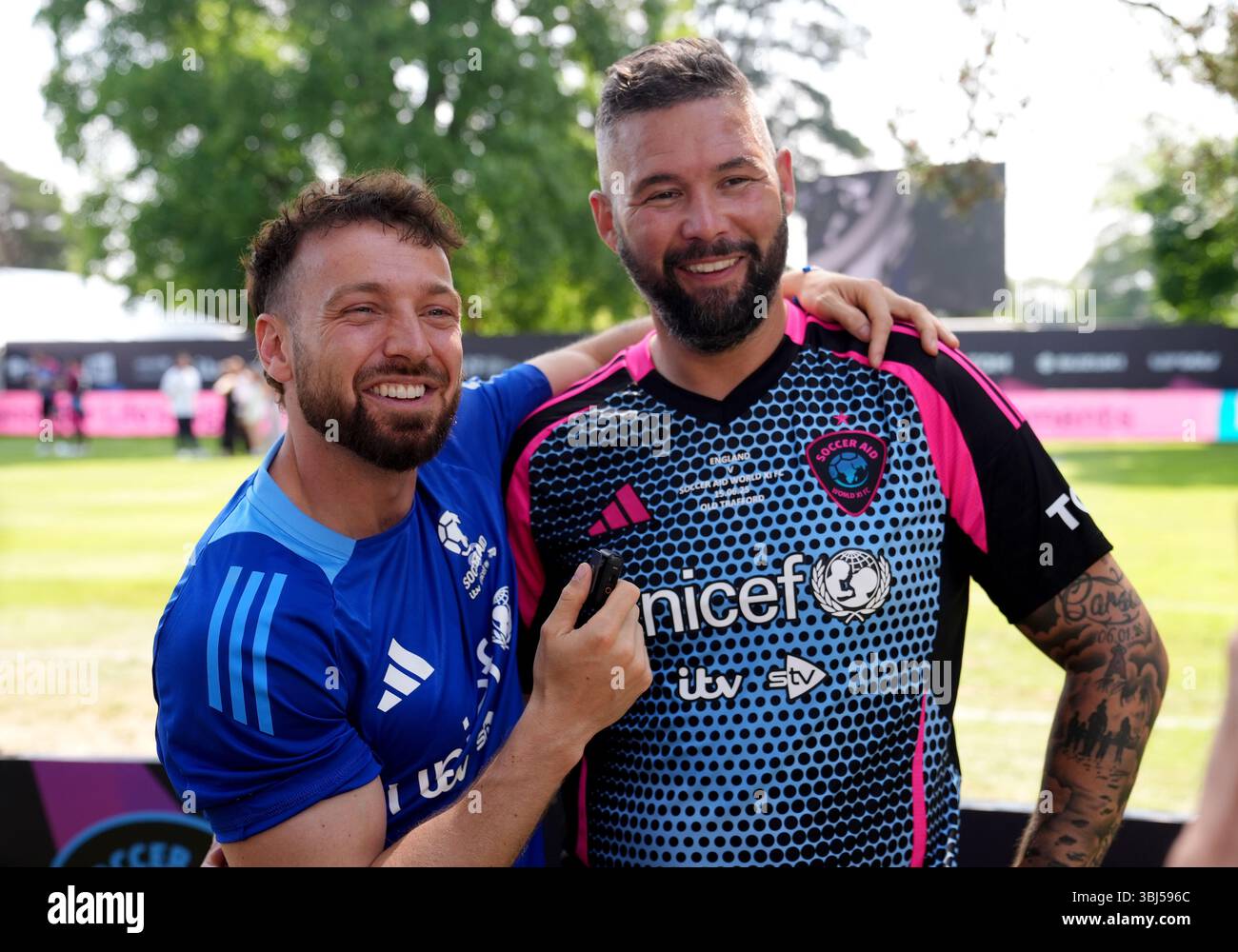 England's Sam Thompson (left) and World XI's Tony Bellew during a ...