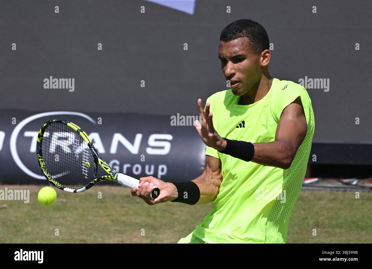 Canada's Felix Auger-Aliassime returns the ball to Germany's Justin Engel during their ...