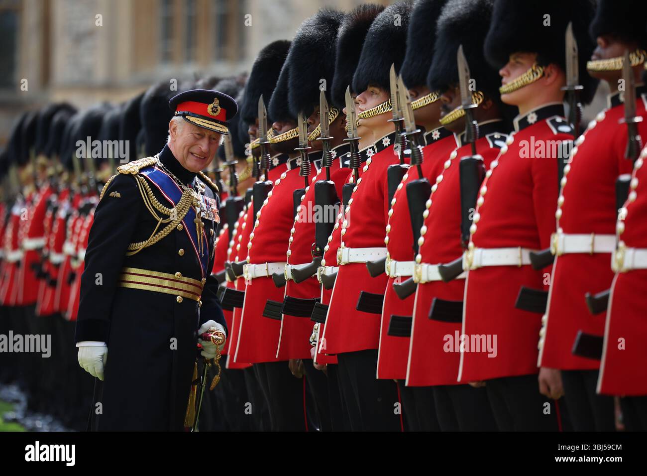 King Charles III, Colonel-in-Chief of the Coldstream Guards, inspects ...