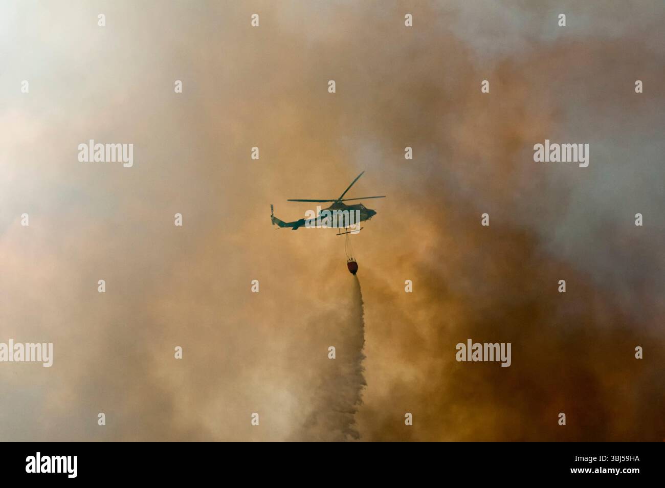Burned helicopter hi-res stock photography and images - Alamy