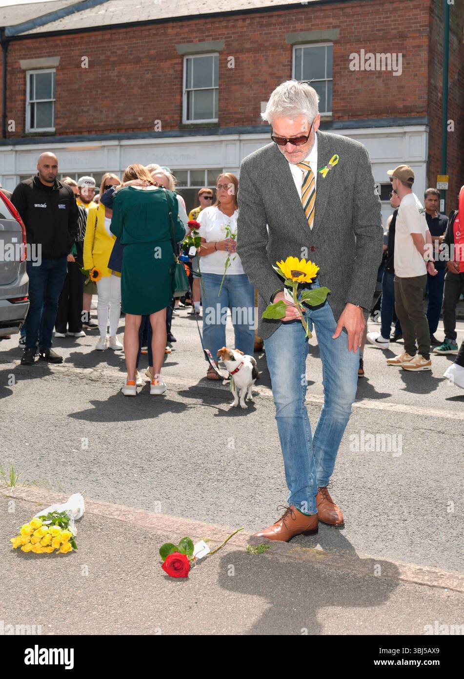 David Webber, the father of Barnaby Webber lays flowers on Ilkeston ...