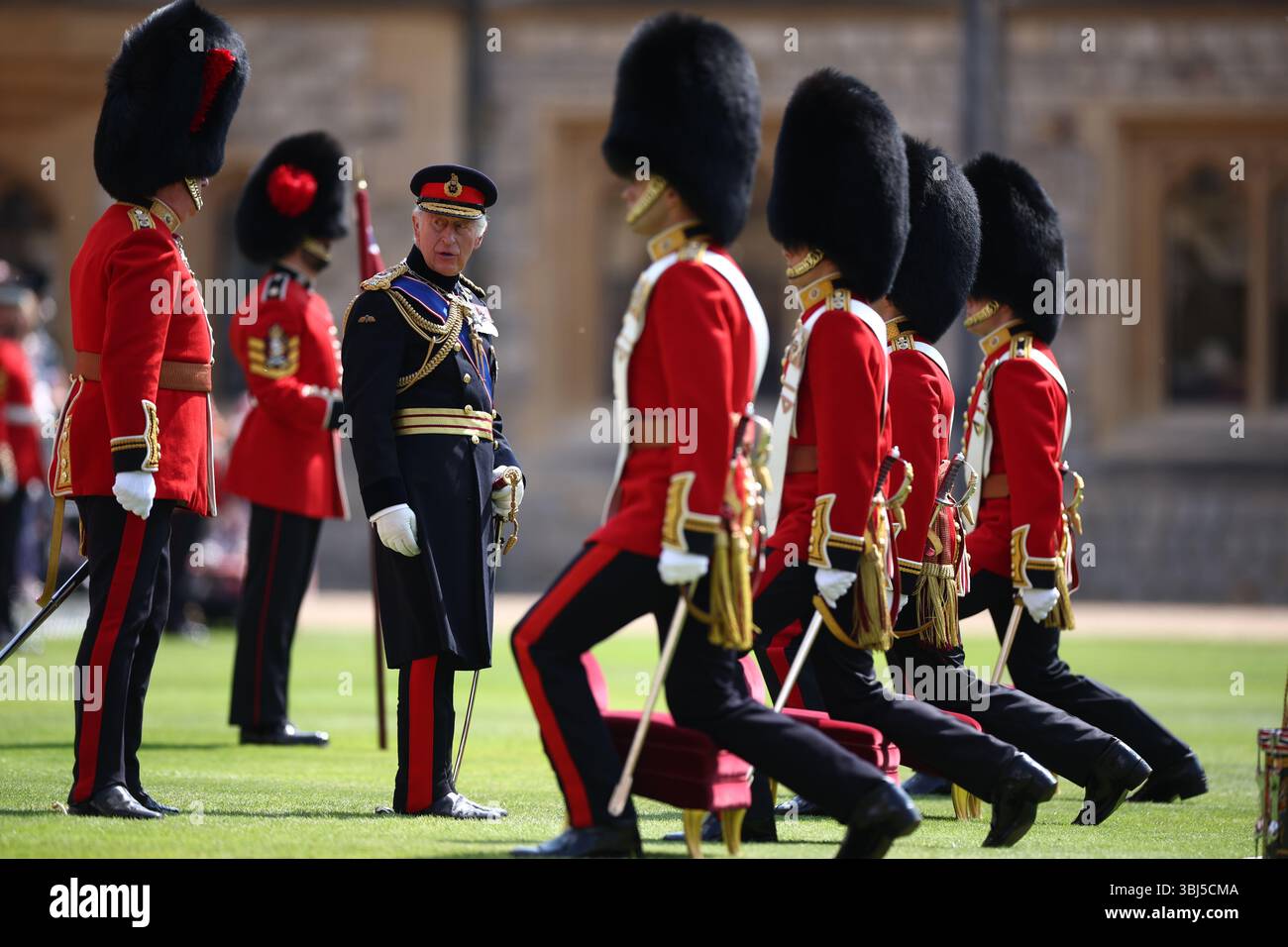 King Charles III, Colonel-in-Chief of the Coldstream Guards, presents ...