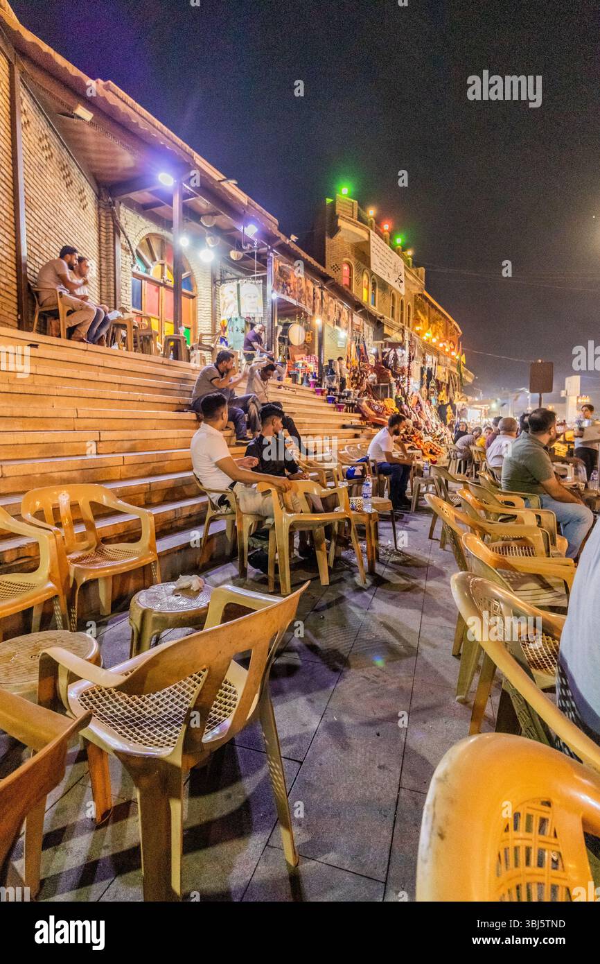 ERBIL, IRAQ - OCTOBER 8, 2022: People at a cafe at Bakhi Shar (City ...