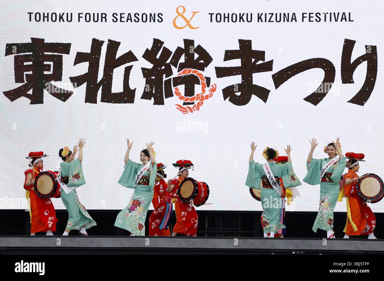 Dancers perform during the opening ceremony of a summer festival hosted ...