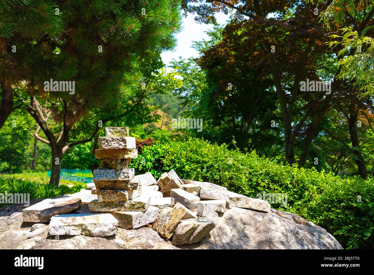 mini tower of stones on stone Stock Photo - Alamy