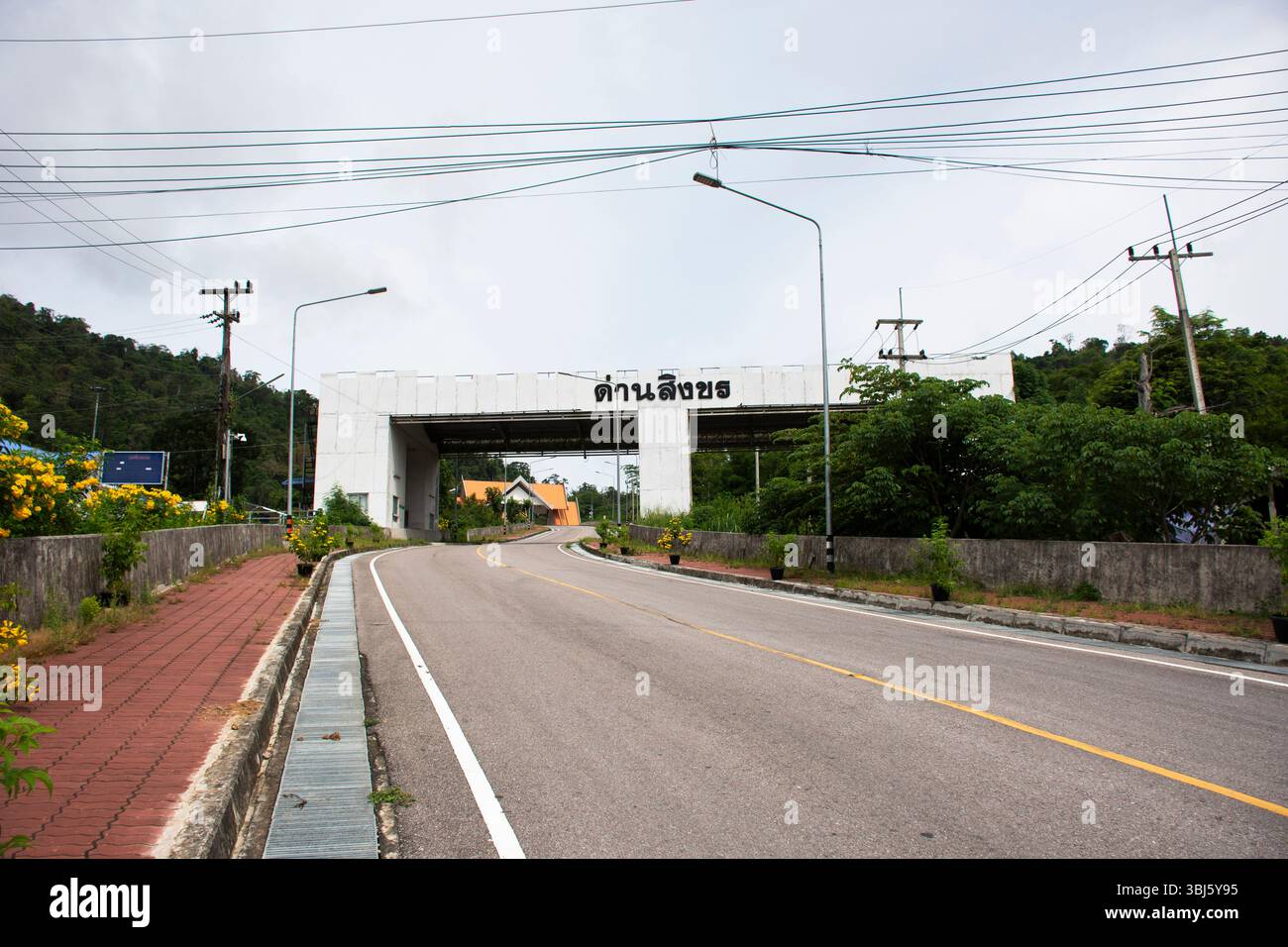 Buildings Singkhon Pass or Sing Khon Border Checkpoint as across the ...