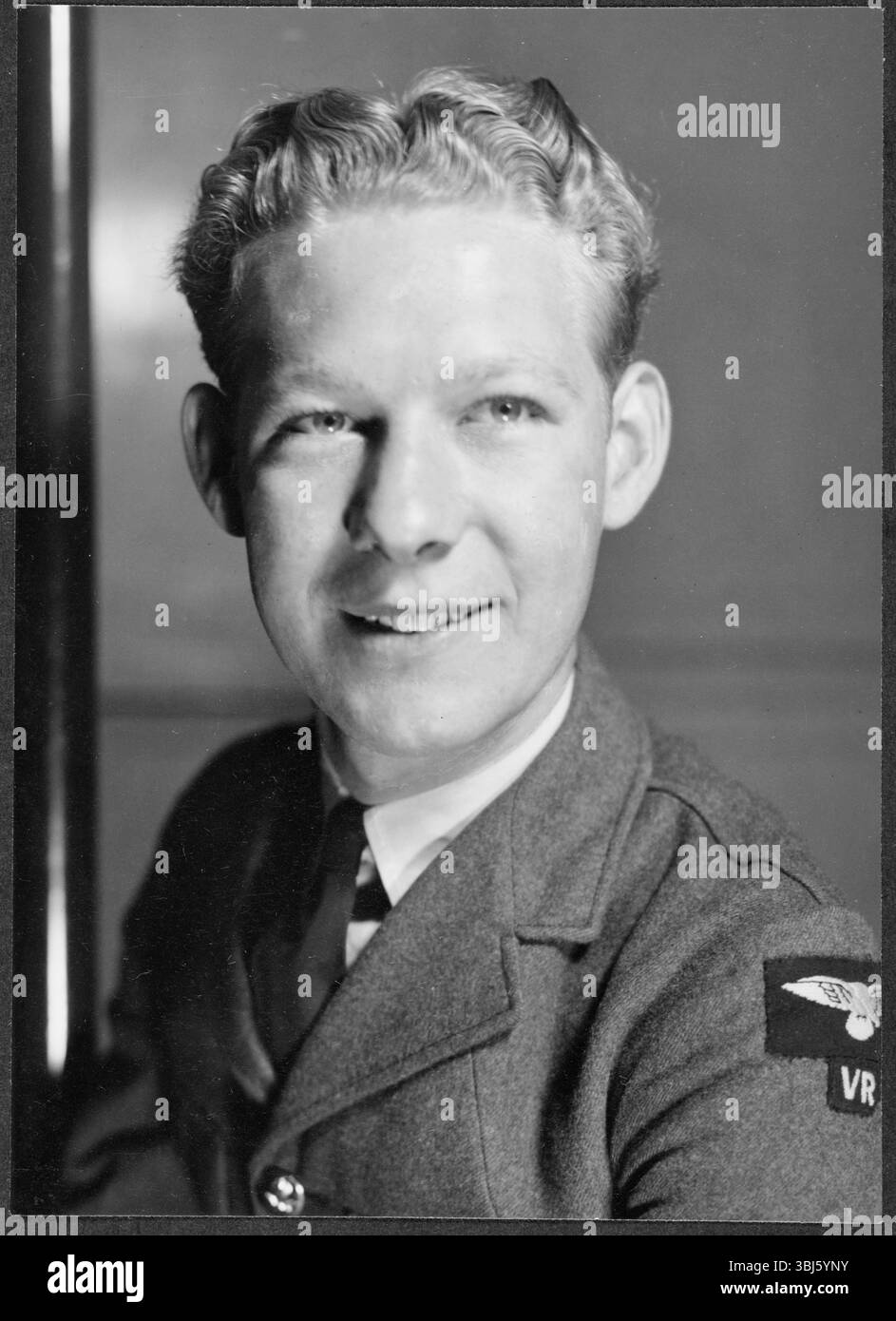 Portrait of RAF aviator Bernard Till in his uniform at RAF Iver Heath ...