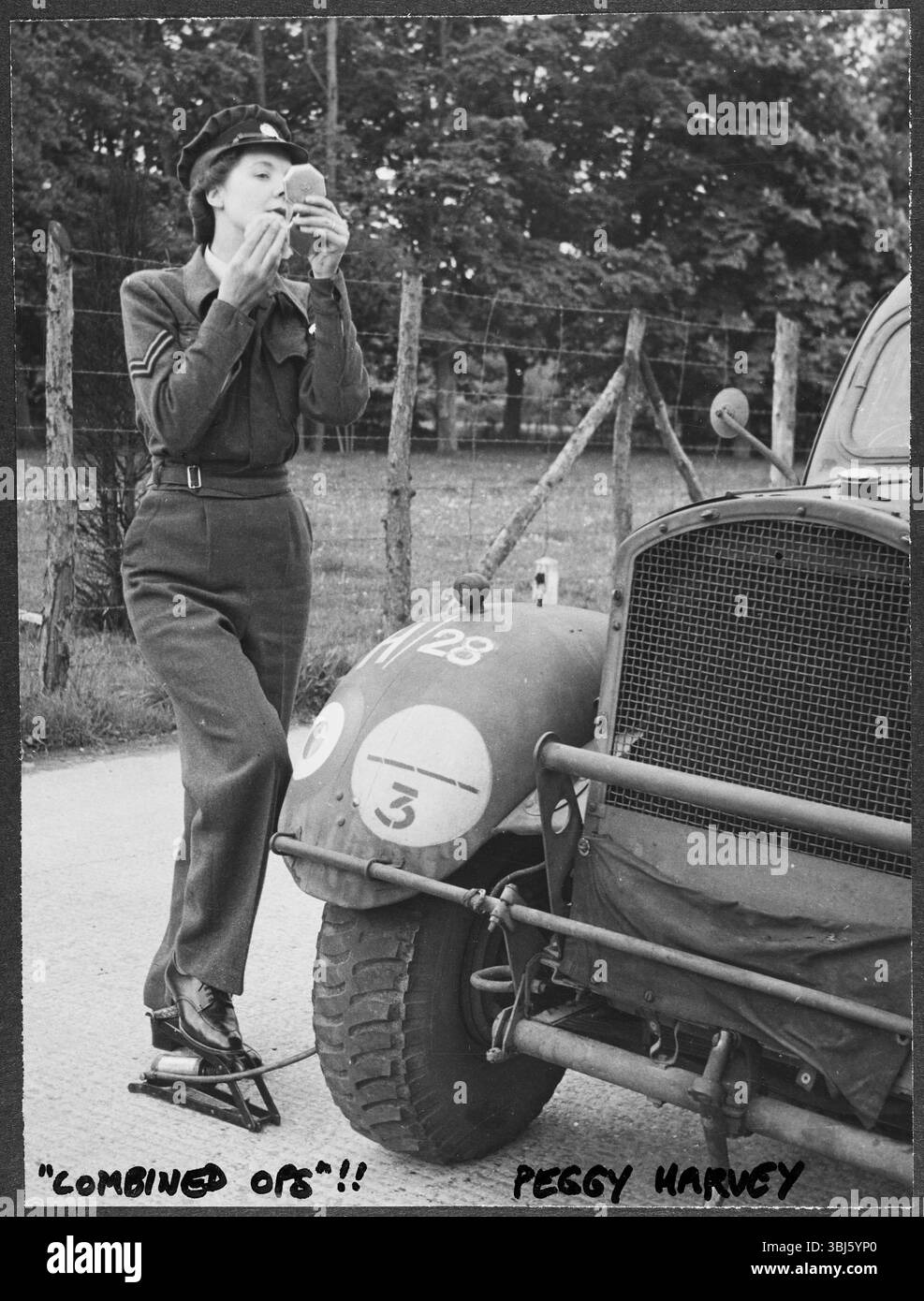Combined Ops!' - WAAF Corporal Peggy Harvey, in her uniform, doing her ...