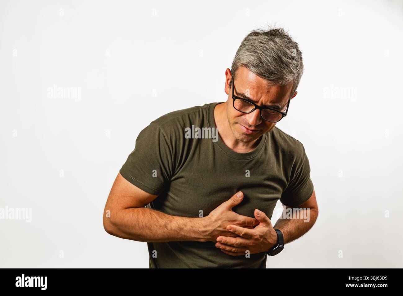 Man standing indoors visibly hi-res stock photography and images - Alamy