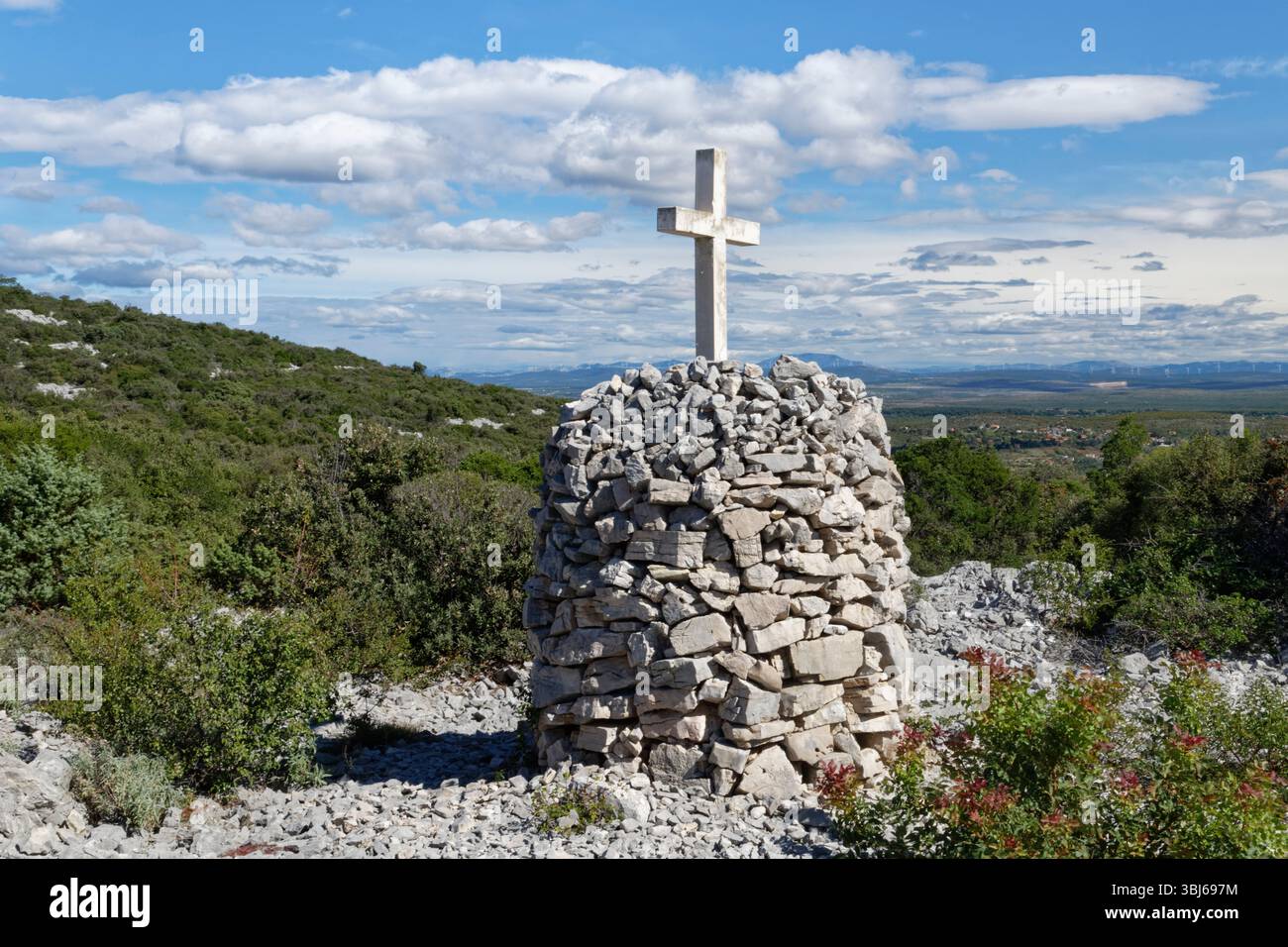 Station of the Cross, one of 14 crosses on stone mounds leading to a ...