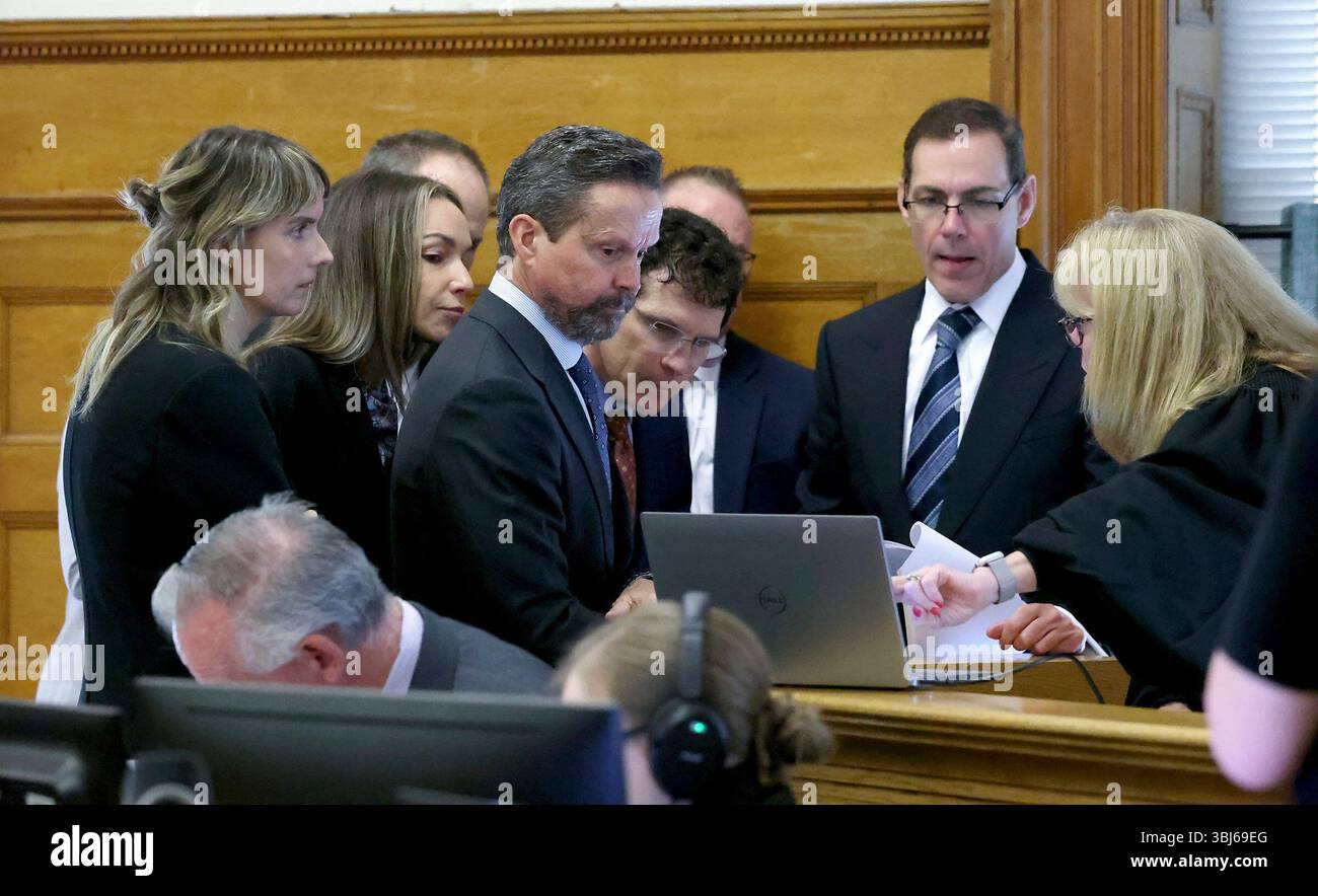 Defendant Karen Read, second from left, defense attorneys and ...
