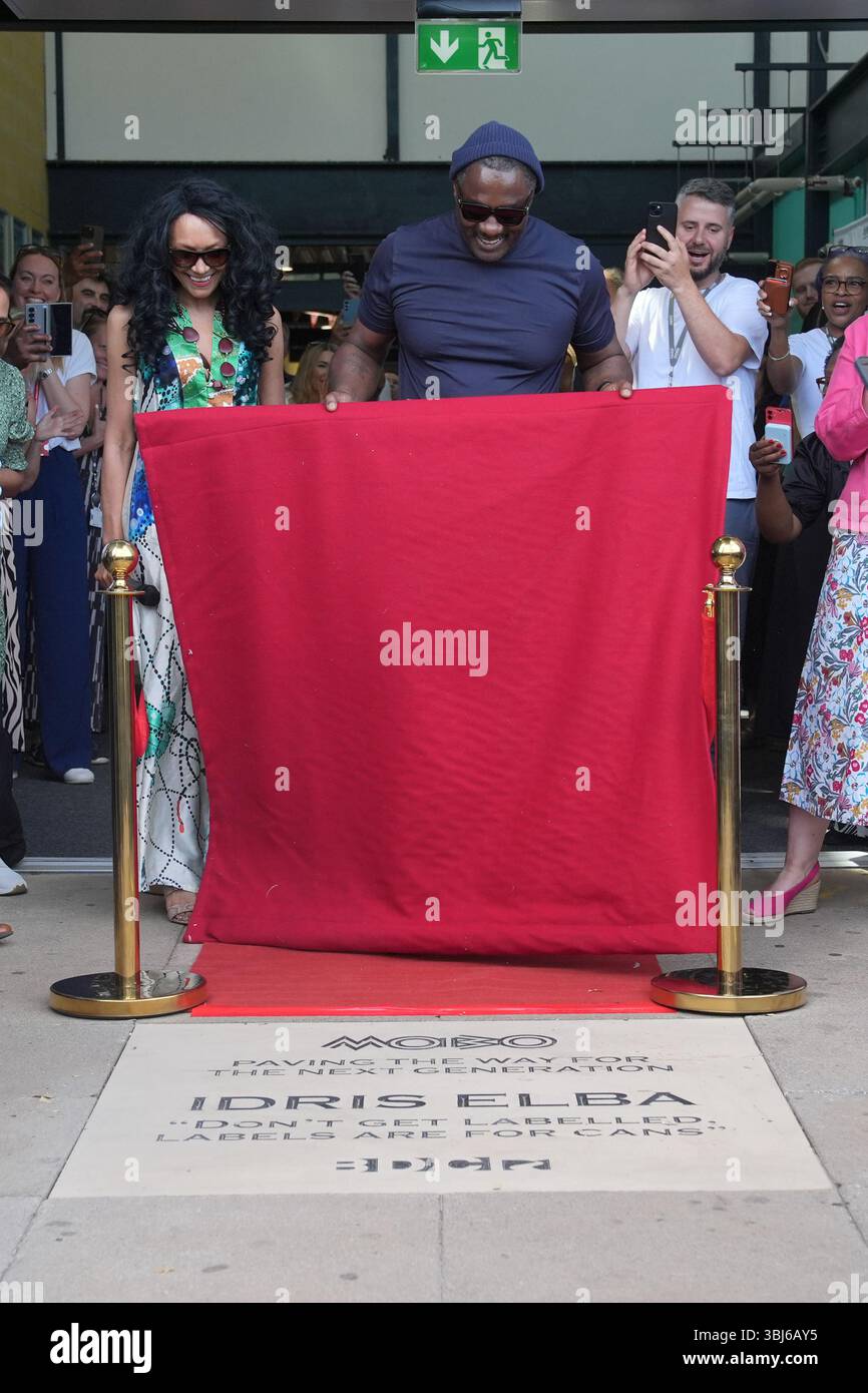 Idris Elba unveils a commemorative MOBO 'Paving the Way' stone, during ...