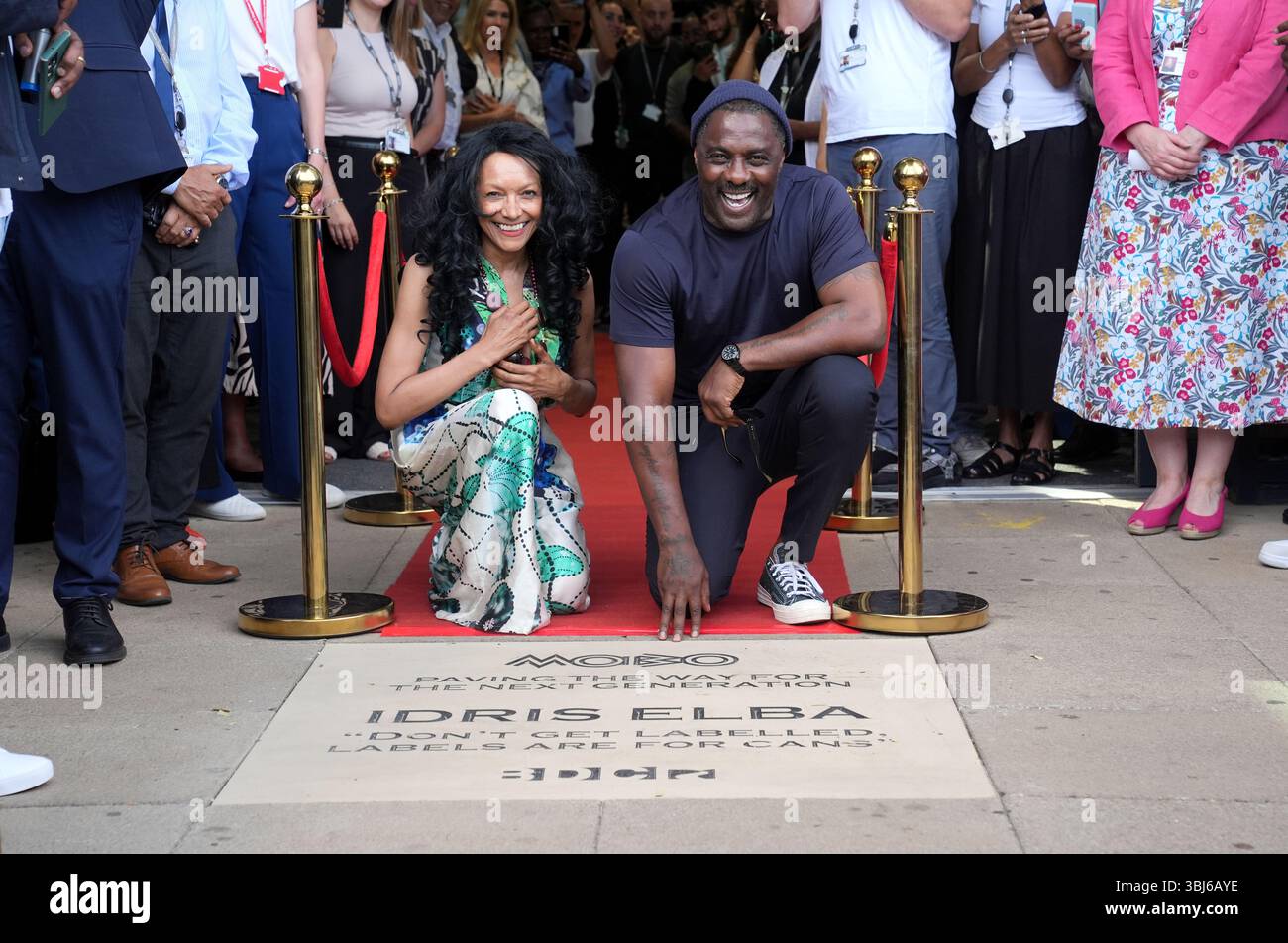 Idris Elba is joined by Kanya King during a visit to Barking and ...