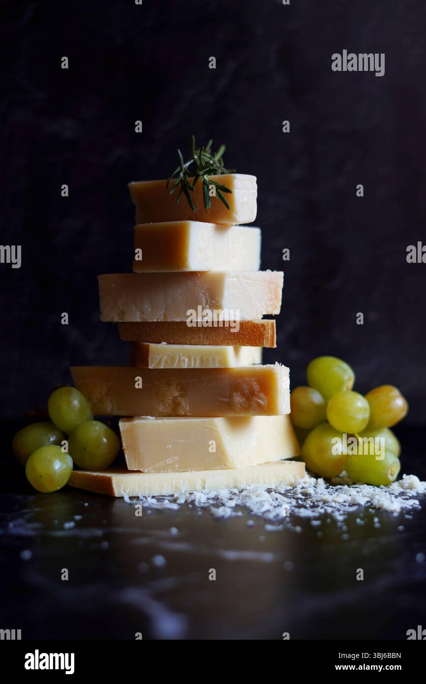 Italian aged gourmet cheeses, Parmigiano Reggiano and Gran Padano, with ...