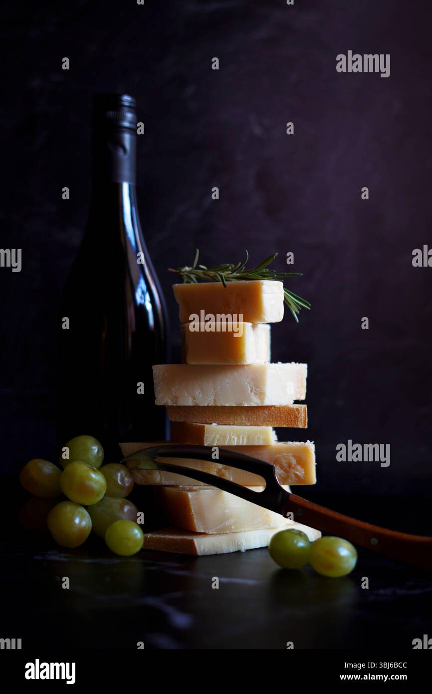 Italian aged gourmet cheeses, Parmigiano Reggiano and Gran Padano, with ...