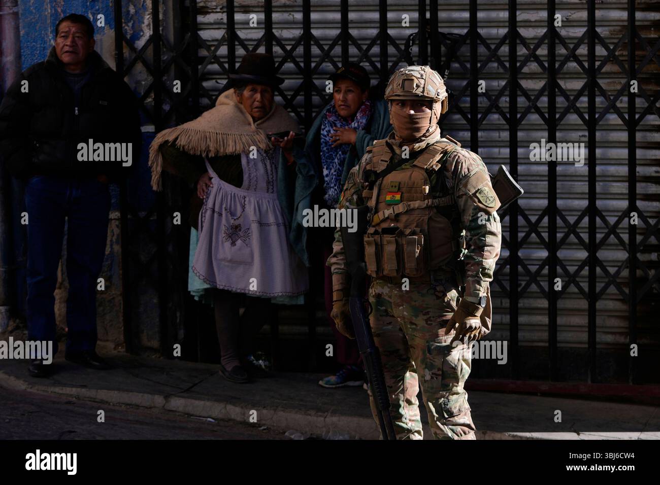 Military police patrol after days of clearing roadblocks set up by supporters of Bolivia's ...