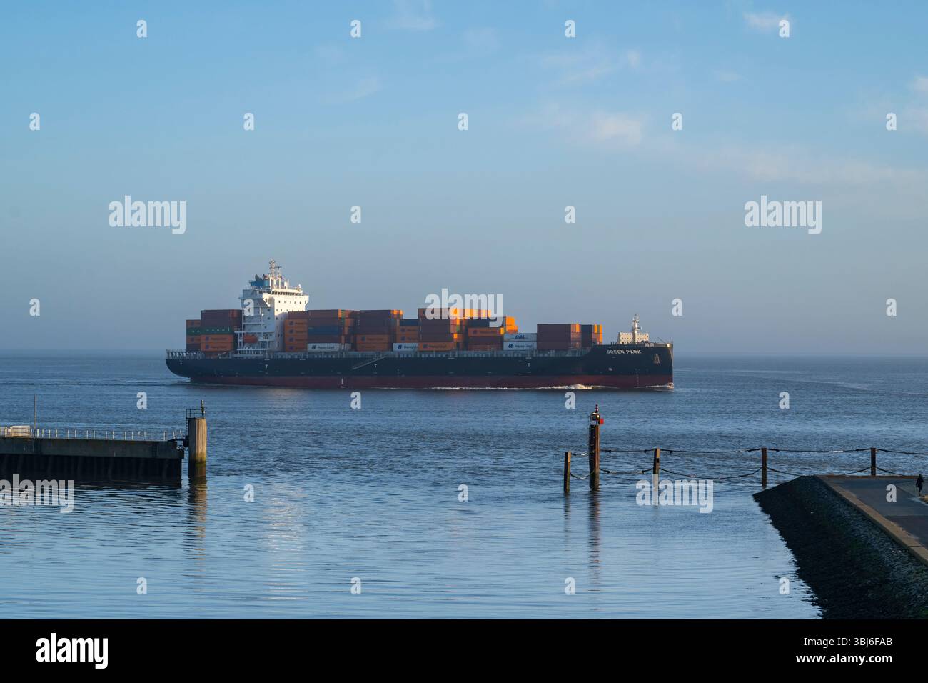 Container ship on the Elbe river Stock Photo - Alamy