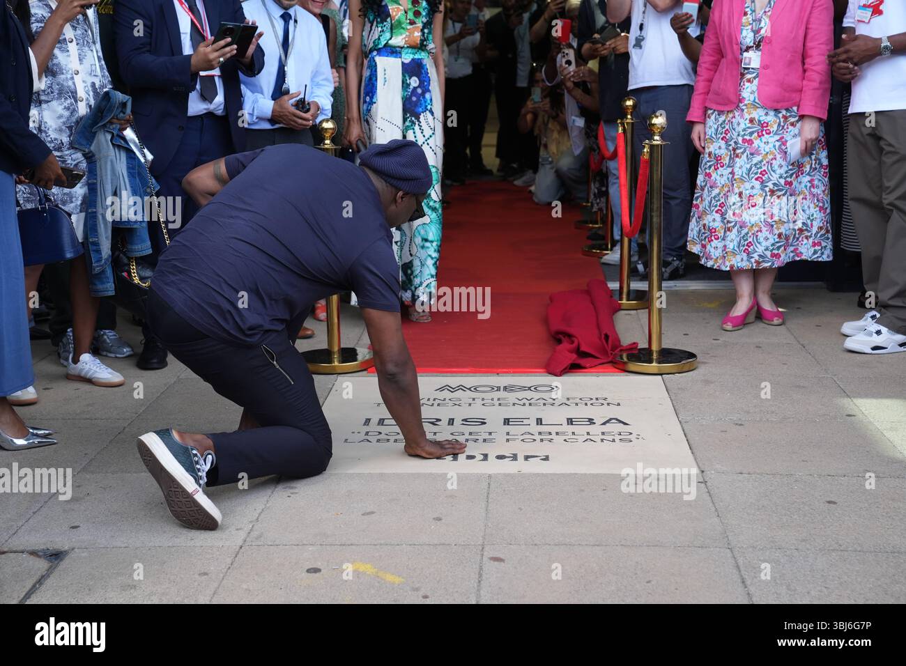 Idris Elba during a visit to Barking and Dagenham College, London ...