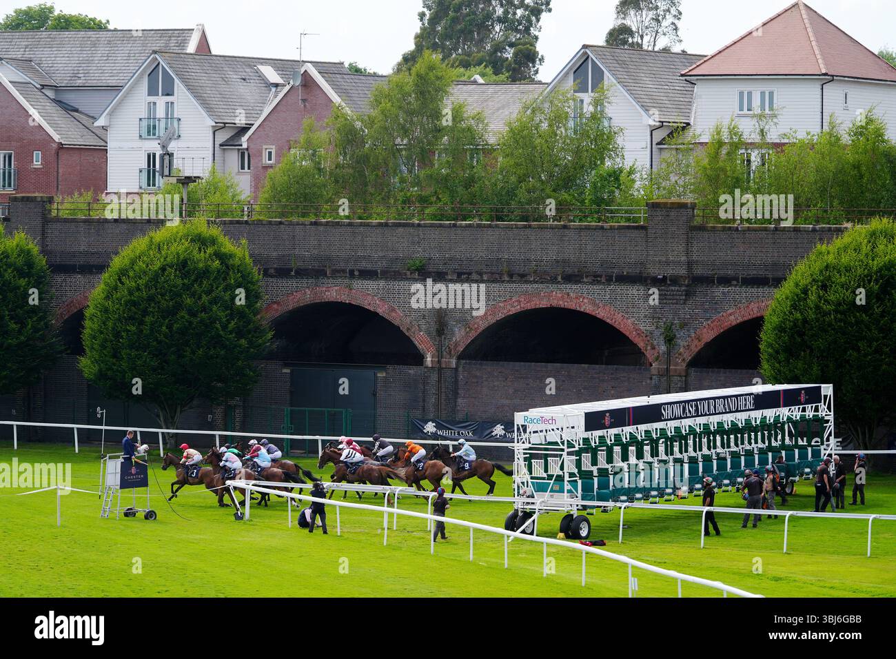 Runners and riders leave the starting gate during the White Oak UK ...