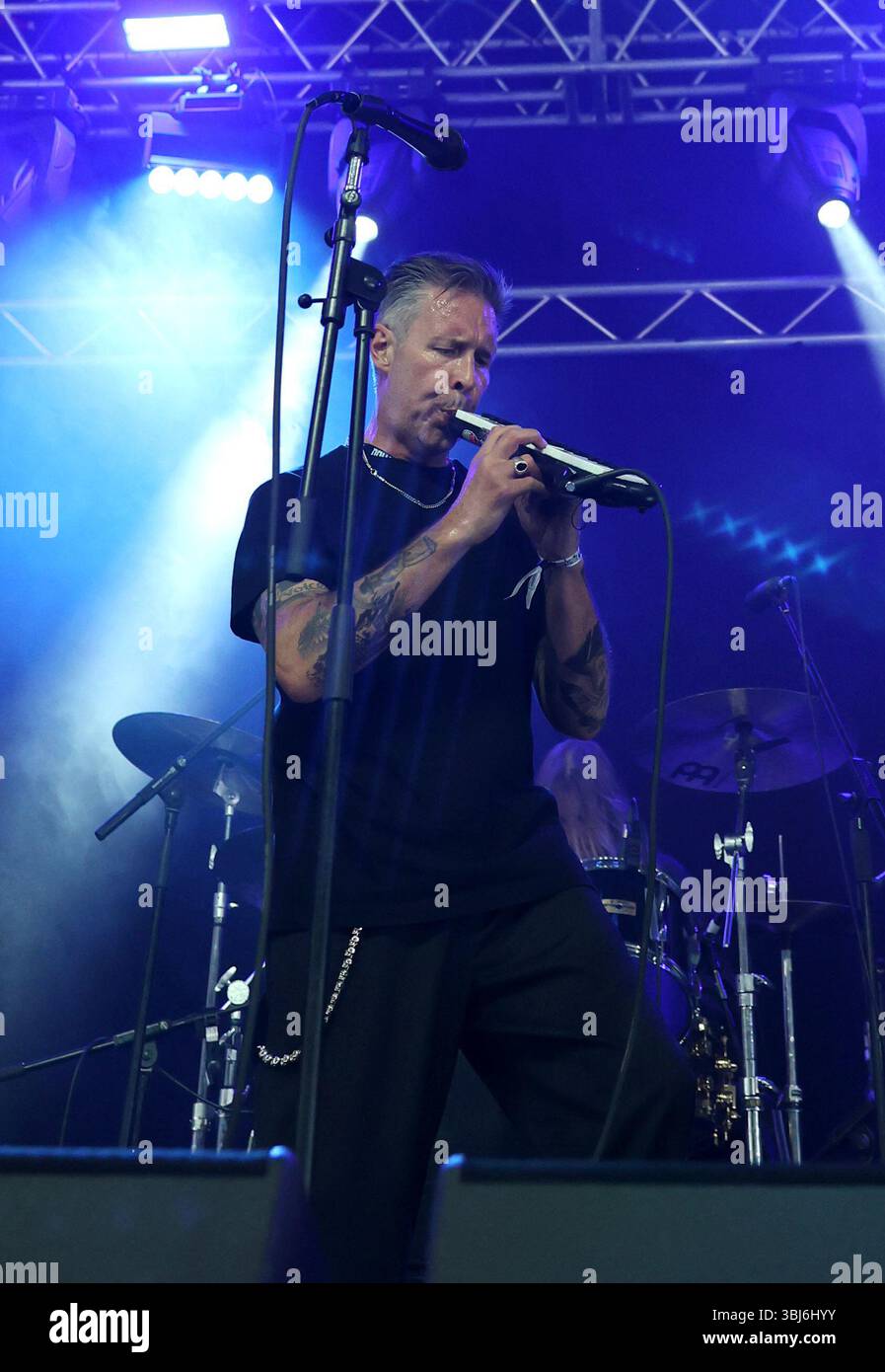 Leicestershire, UK. Friday June 13, 2025. Paddy Considine performs with ...
